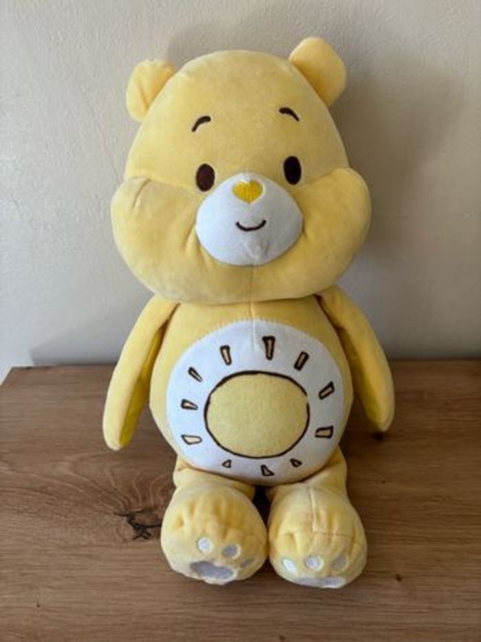 Doudou eveil bisounours jaune soleil care bears baby - Care Bears | Beebs by Kiabi